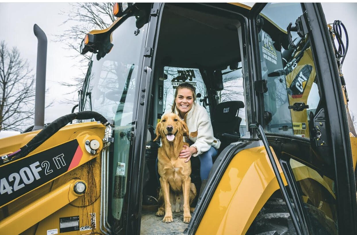 Taylor White puts his Girl in the Backhoe